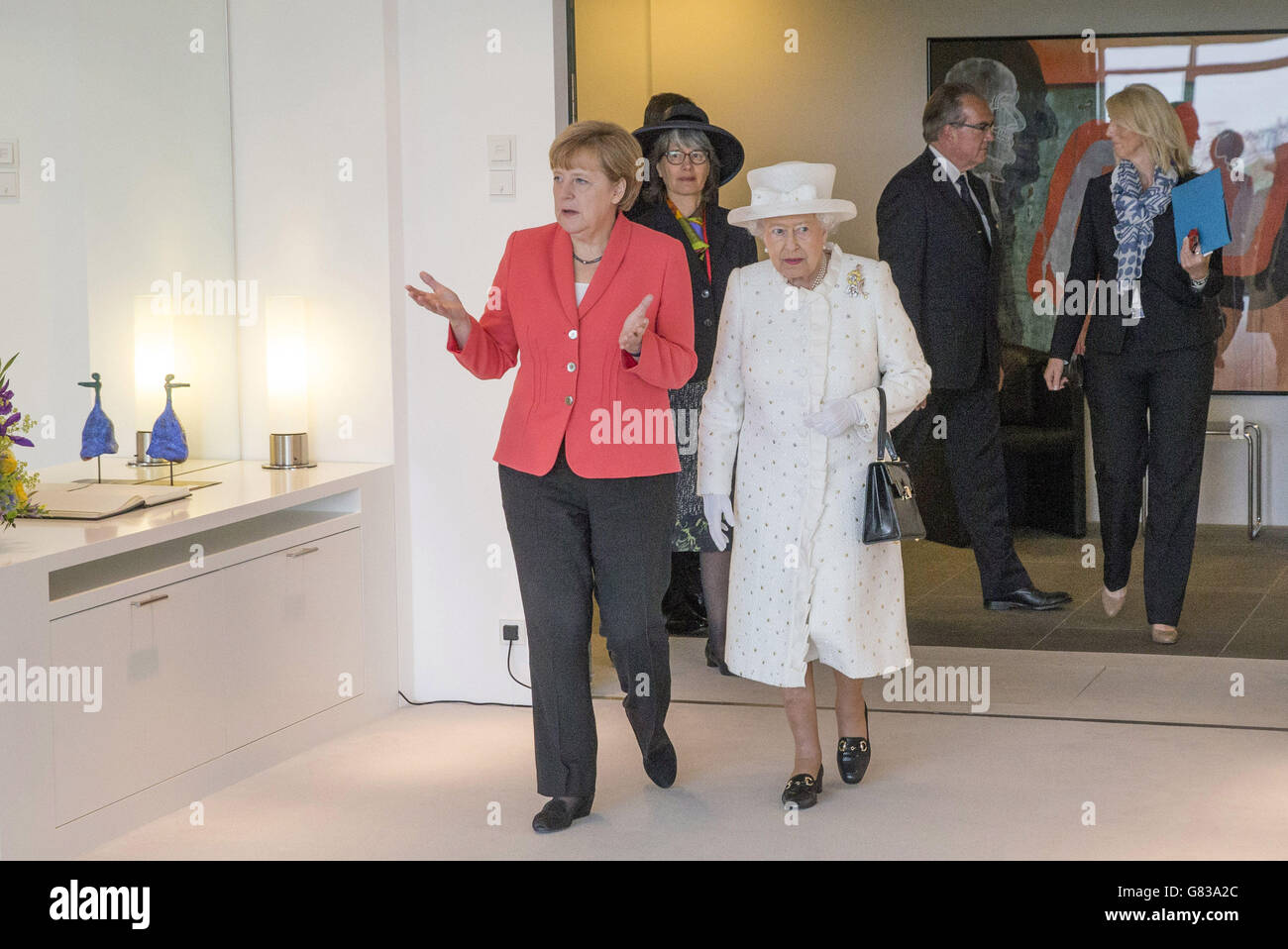 Queen Elizabeth II is met by German Chancellor Angela Merkel at the ...