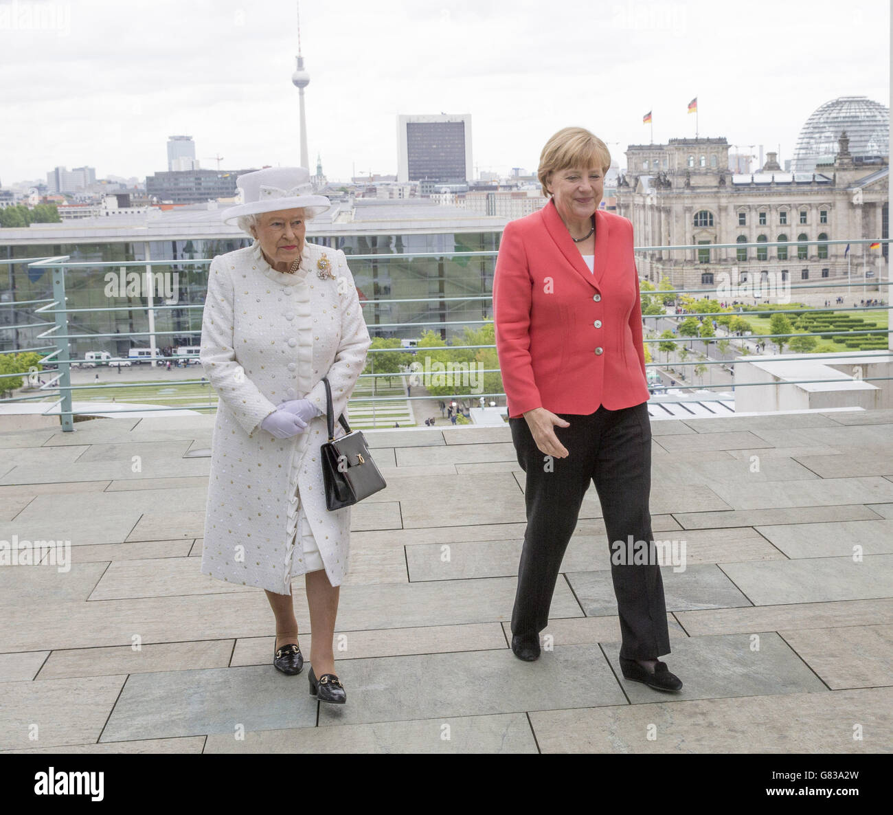 Queen Elizabeth II is met by German Chancellor Angela Merkel at the ...