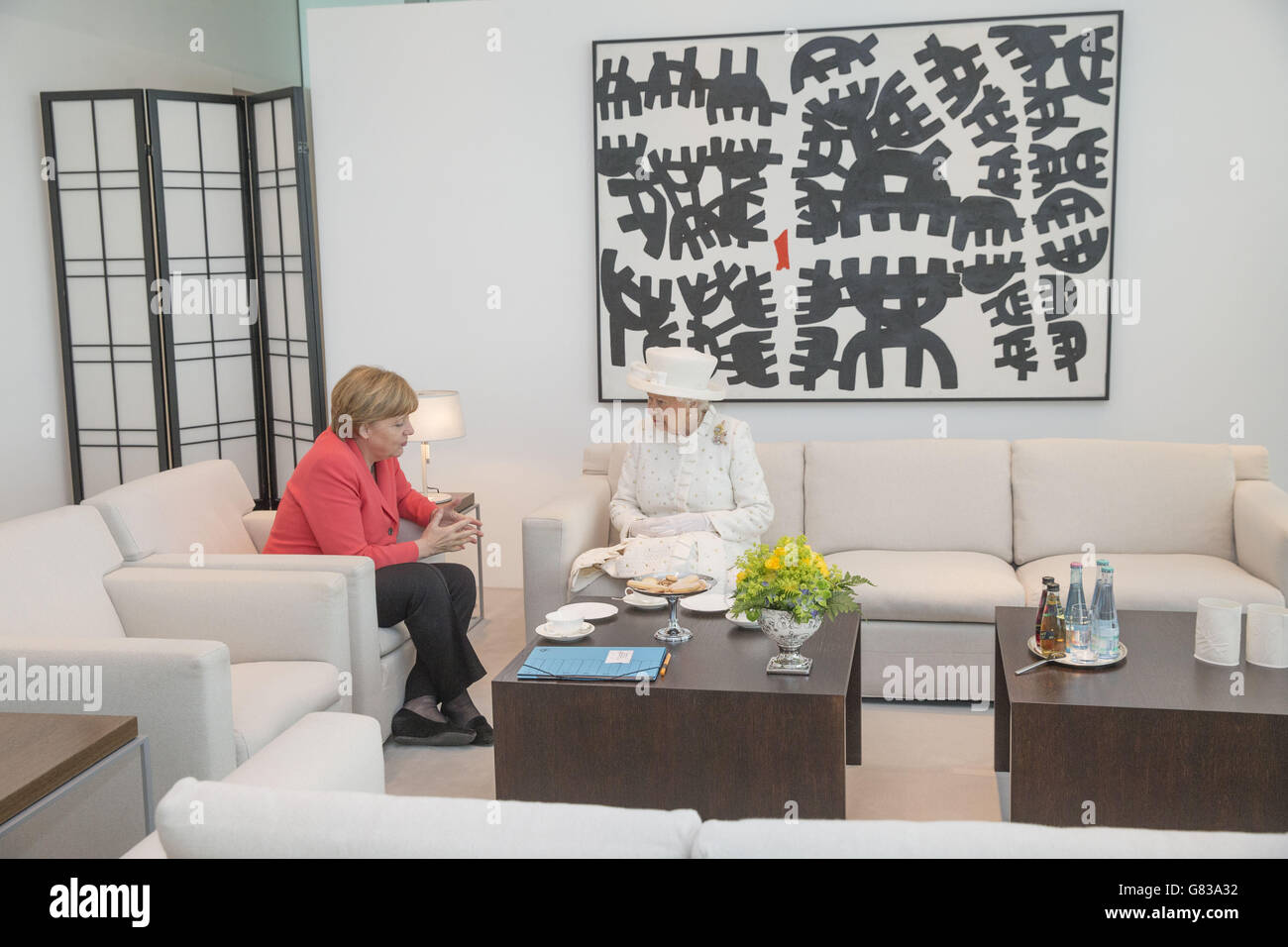 Queen Elizabeth II is met by German Chancellor Angela Merkel at the ...