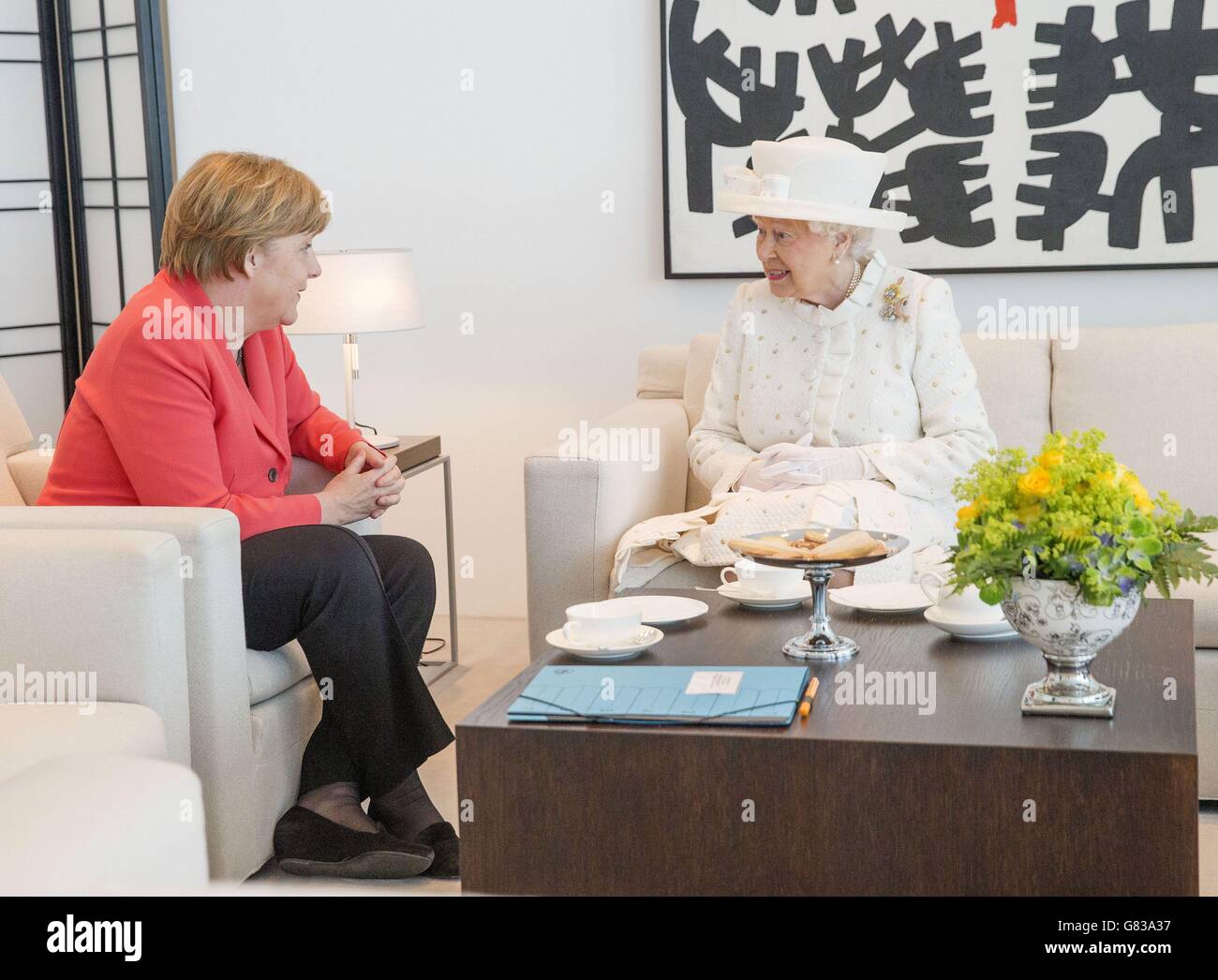 Queen Elizabeth II is met by German Chancellor Angela Merkel at the ...
