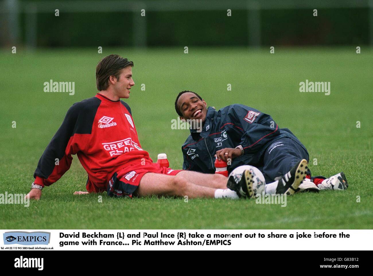 David Beckham {L} and Paul Ince {R} take a moment out to share a joke ...