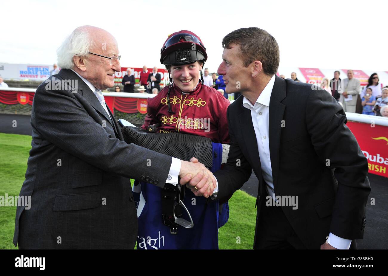 Trainer Johnny Murtagh and his daughter Caroline are congratulated by ...