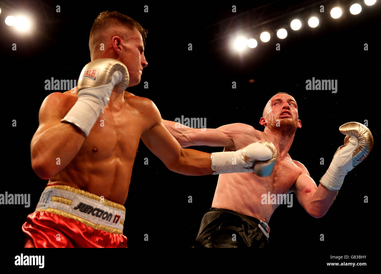 Tommy Martin (left) and Tommy Needham during the Light Welterweight ...