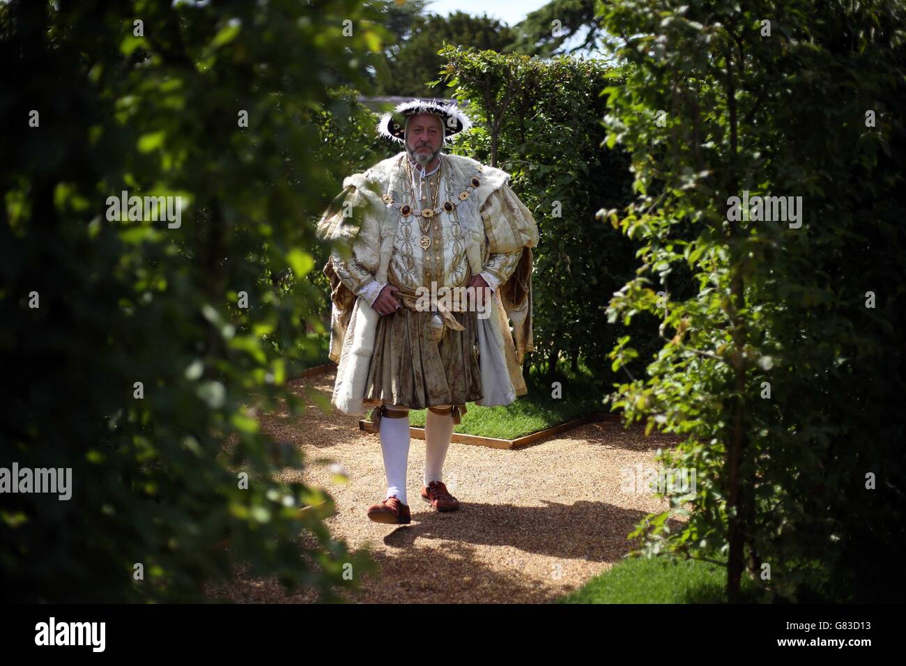 RHS Hampton Court Palace Flower Show 2015. An actor dressed as King ...