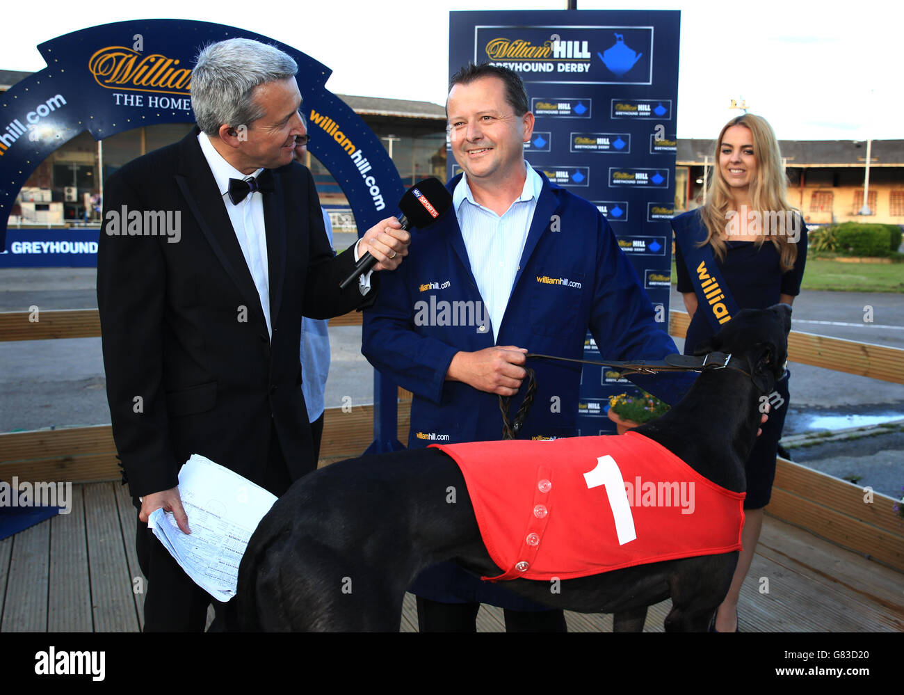 Sky Sports interview trainer Steve Gammon (centre) with dog Jetstream ...