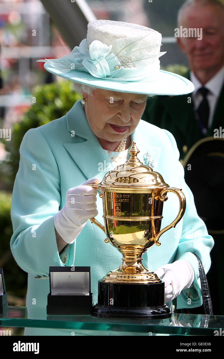 Queen Elizabeth II prepares to present the Gold Cup trophy to the ...