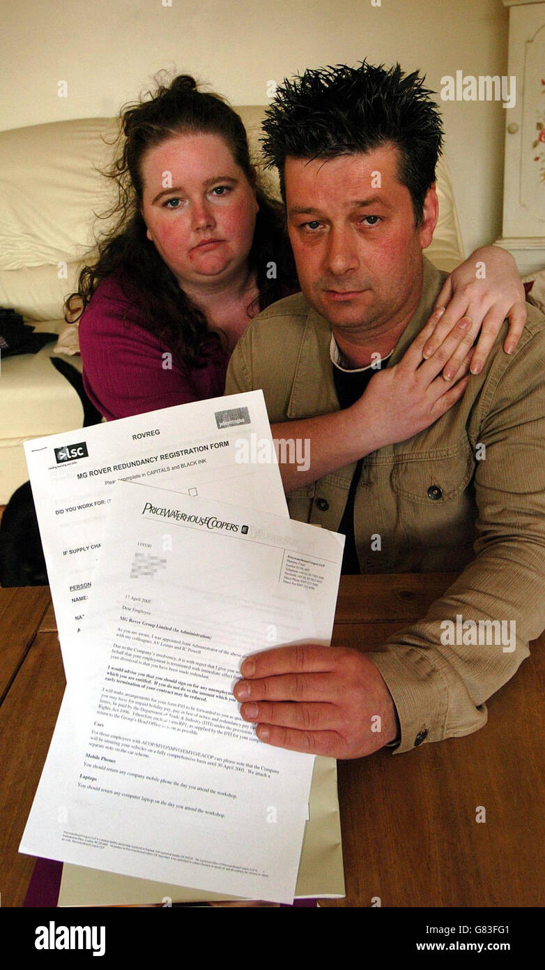Andrew Cartwright with his wife Gemma holding his redundancy notice. He ...