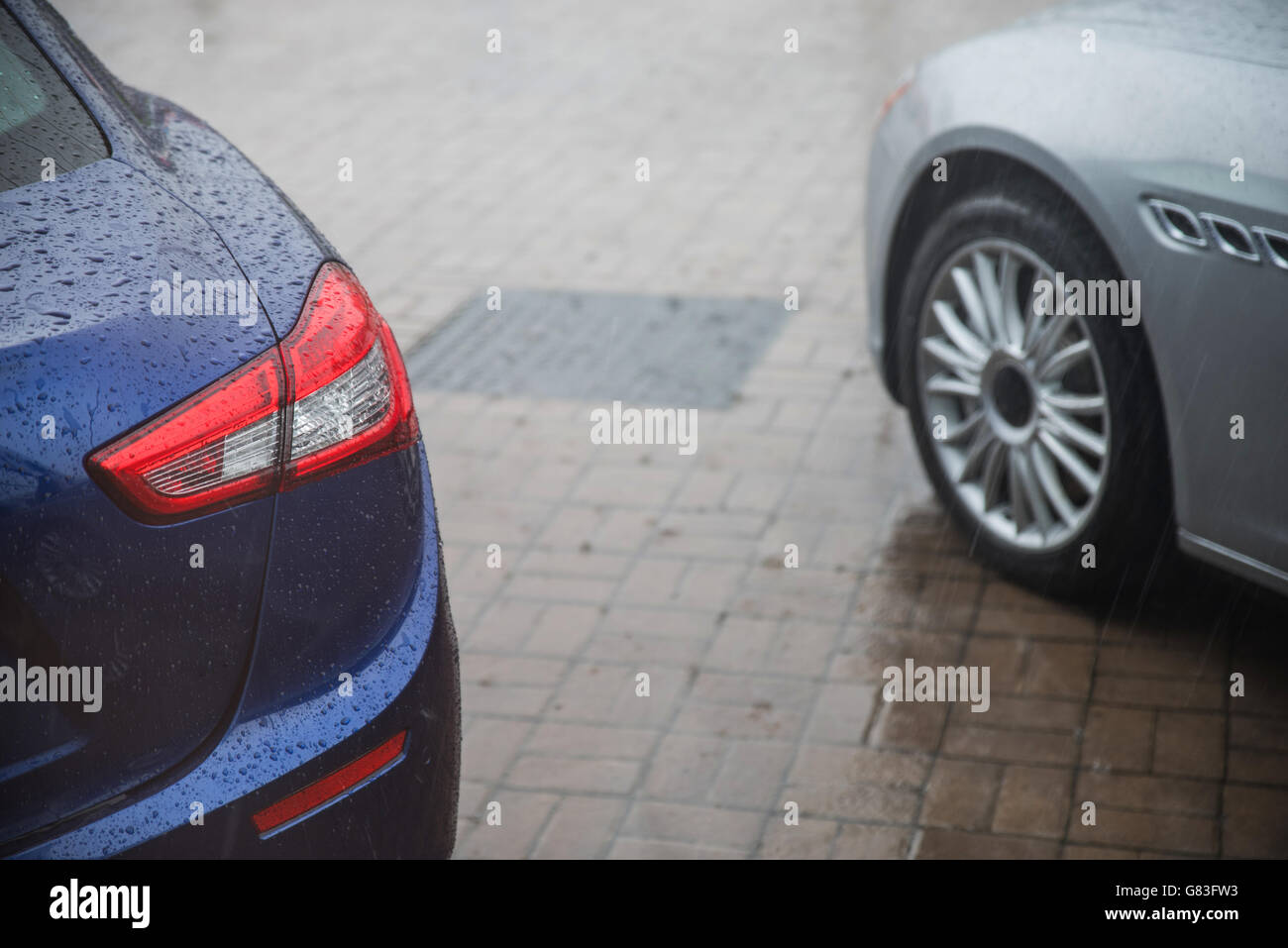 raindrops on modern car in rainy season Stock Photo - Alamy