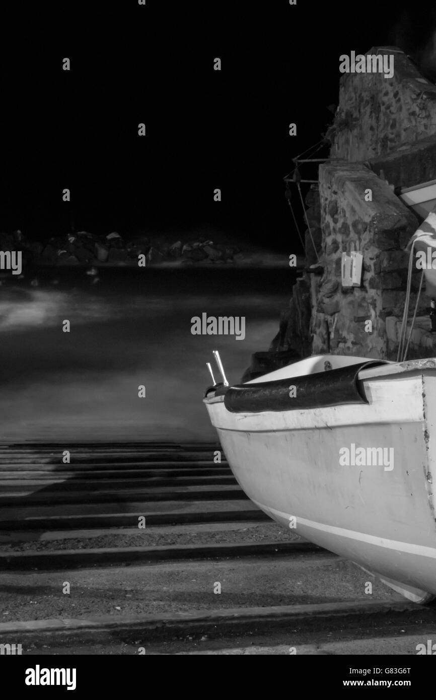 Sail boat on harbour slope italian coast Stock Photo - Alamy