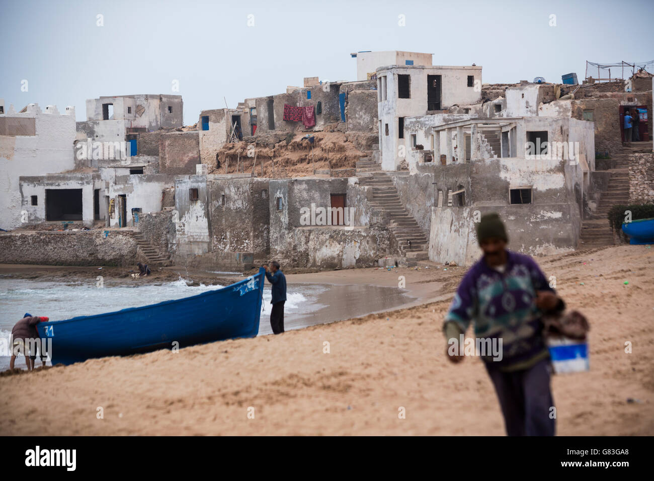 Fisherman land ashore in Tifnit beach near Agadir, Morocco Stock Photo ...
