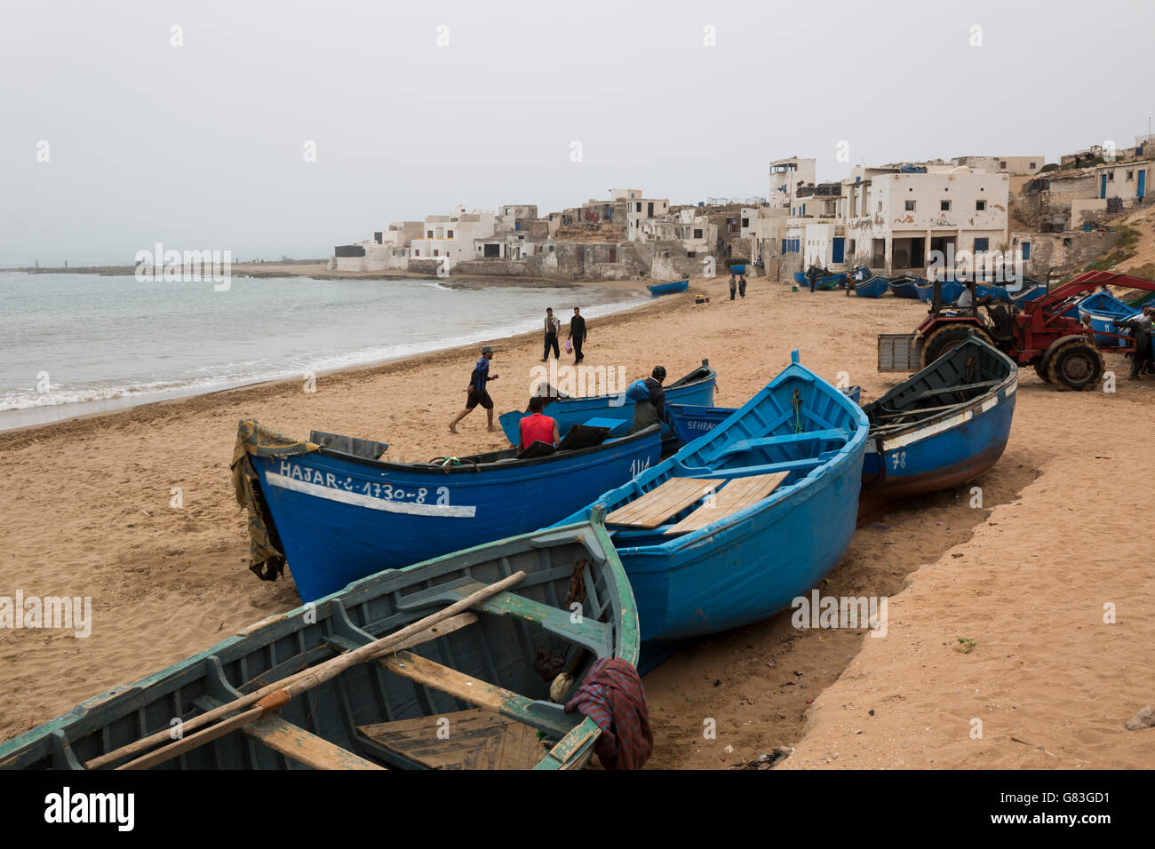 Fisherman land ashore in Tifnit beach near Agadir, Morocco Stock Photo ...