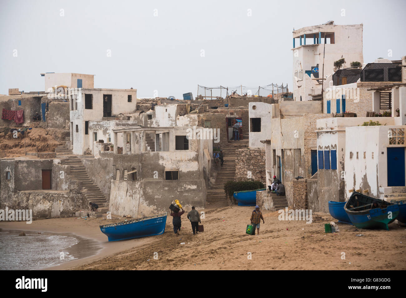 Fisherman land ashore in Tifnit beach near Agadir, Morocco Stock Photo ...