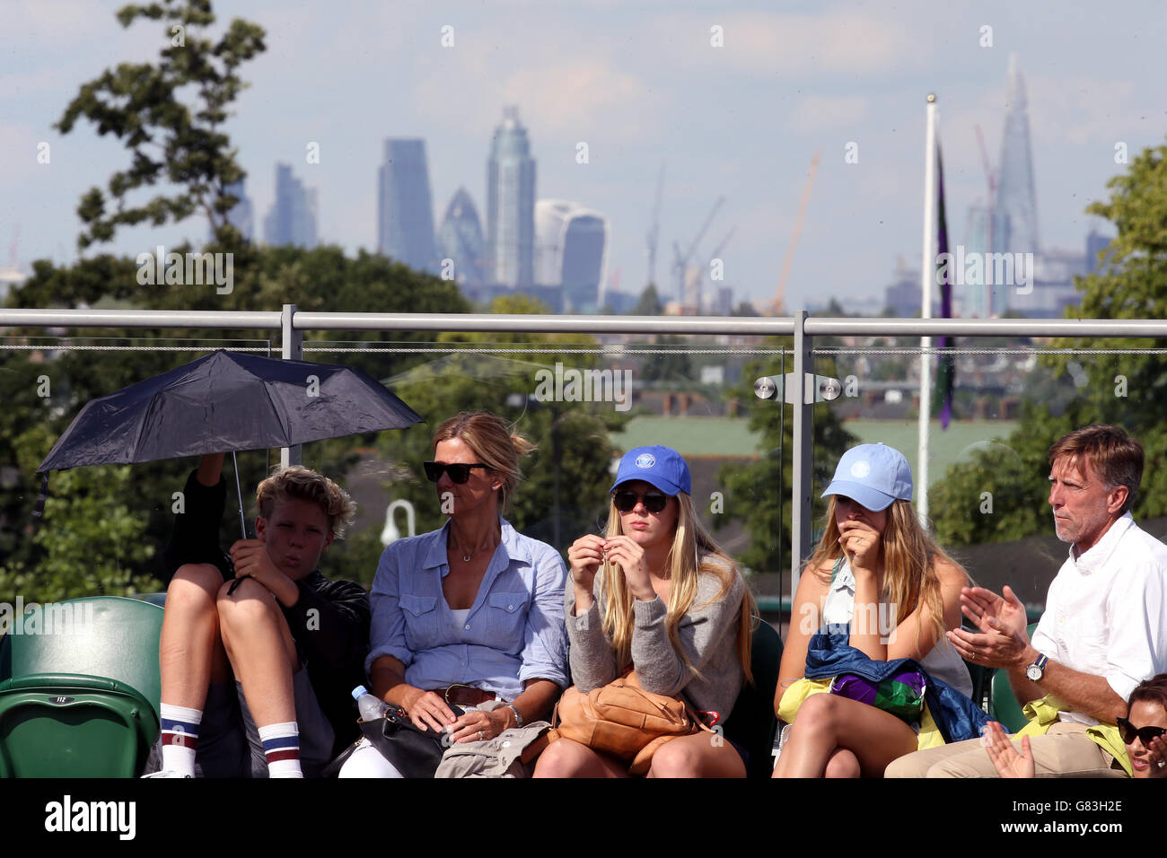 Spectators watch the action with the London skyline in background on ...