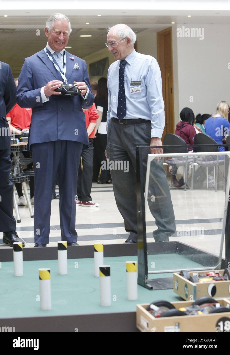 The Duke of Rothesay manipulates a remote control robot during an event ...