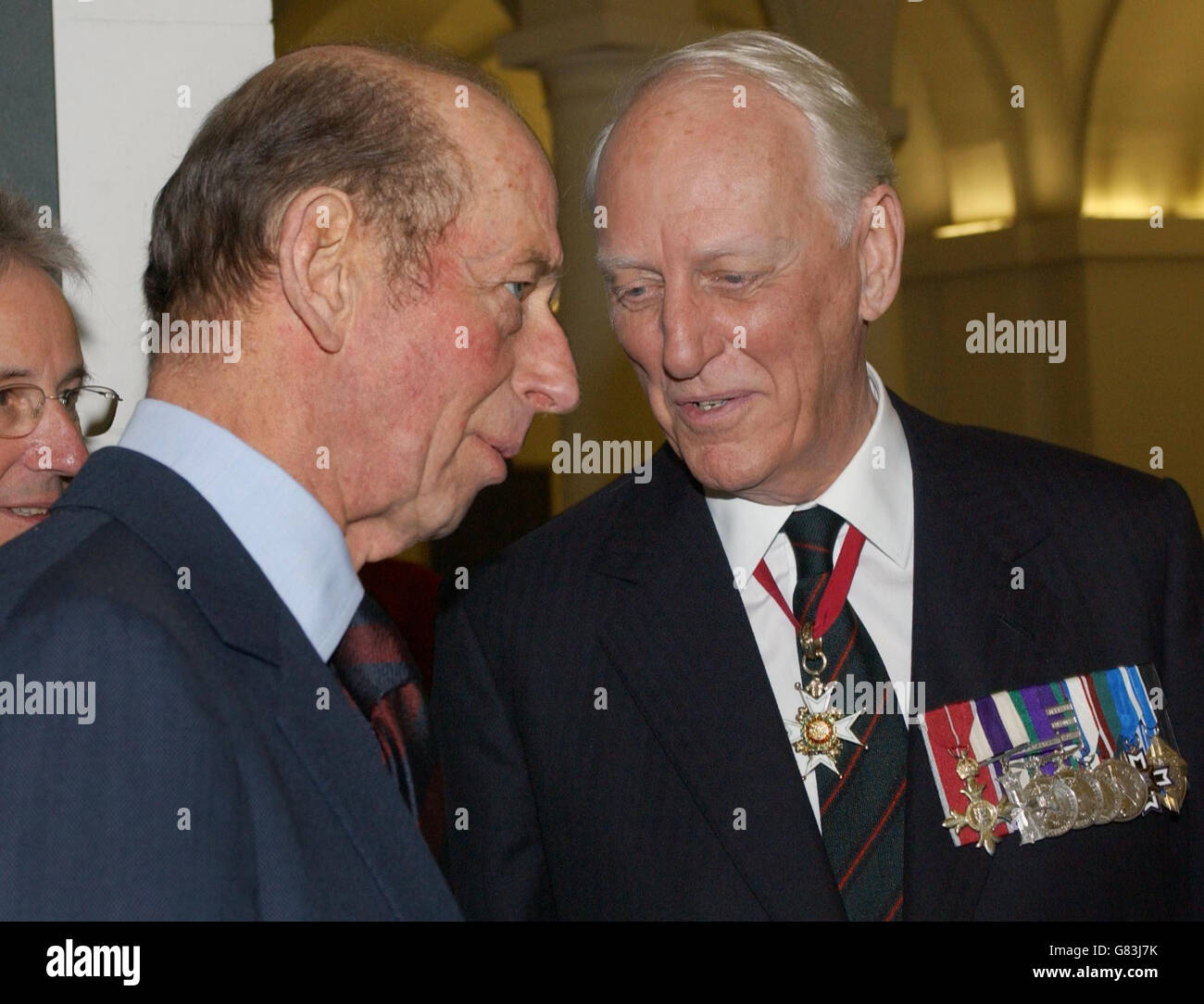 The Duke of Kent (left), representing the Royal family talks with ...