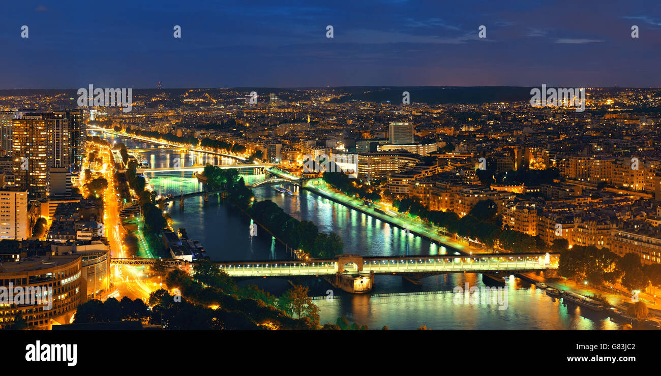 Paris city skyline rooftop view with River Seine at night, France Stock ...