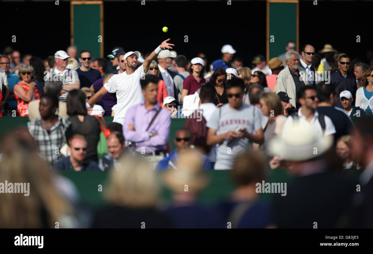 General view as Steve Johnson serves as spectators watch on day One of ...