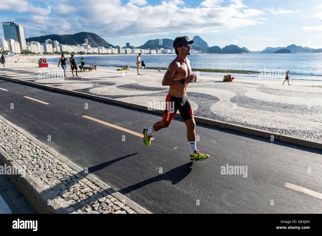 RIO DE JANEIRO - APRIL 3, 2016: A young carioca Brazilian man jogs ...