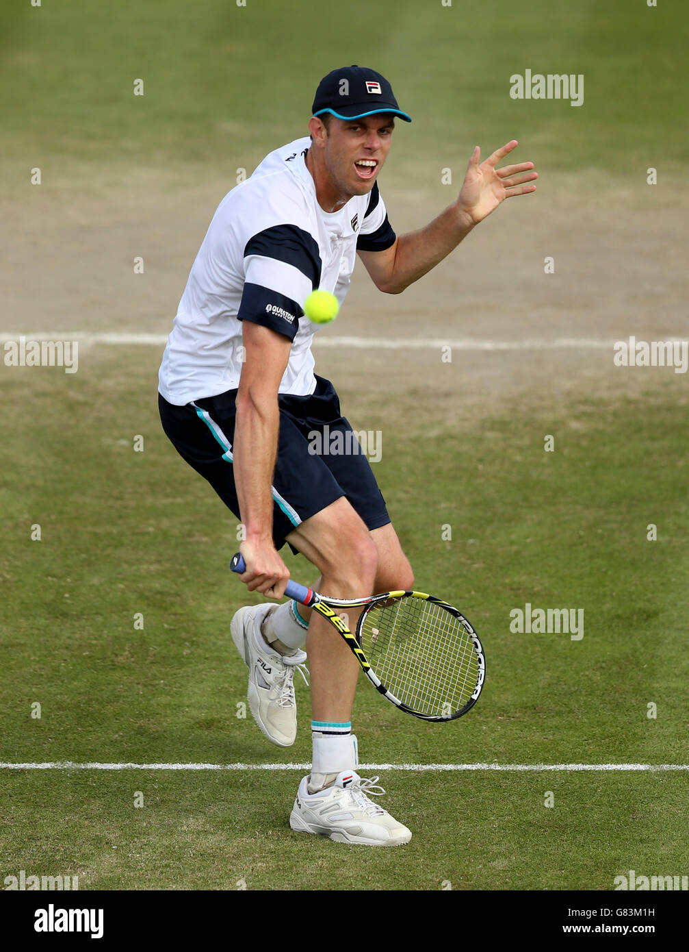 USA's Sam Querrey in action against France's Gilles Simon Stock Photo ...