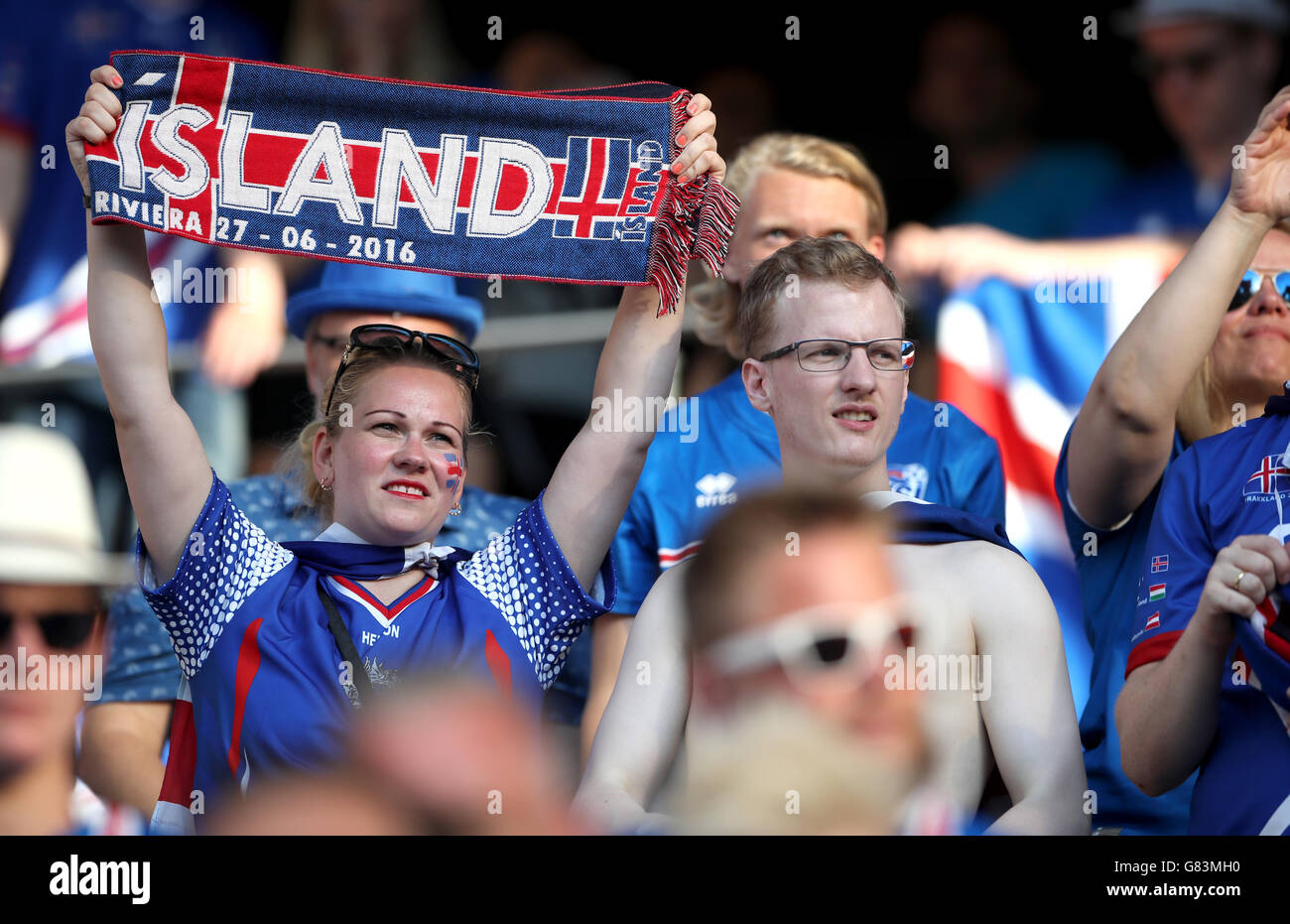 Iceland fans cheer on their side in the stands before the Round of 16 ...