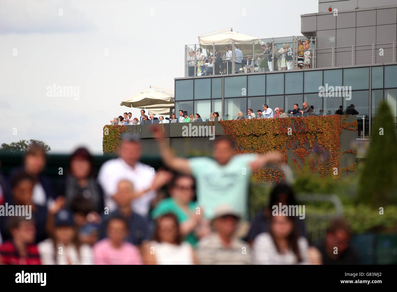 Spectators watch action a balcony hi-res stock photography and images ...