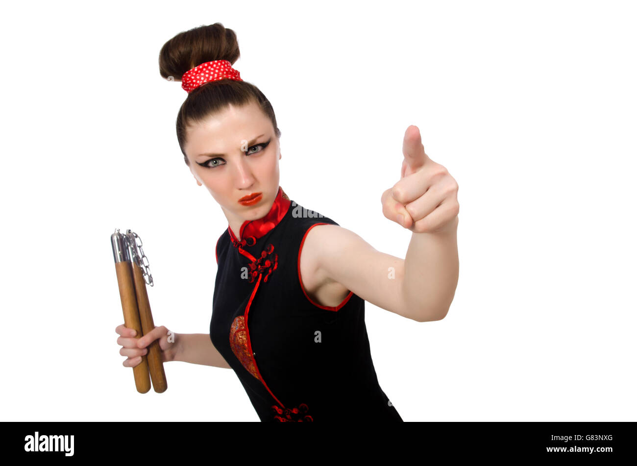 Funny woman with nunchucks isolated on white Stock Photo - Alamy