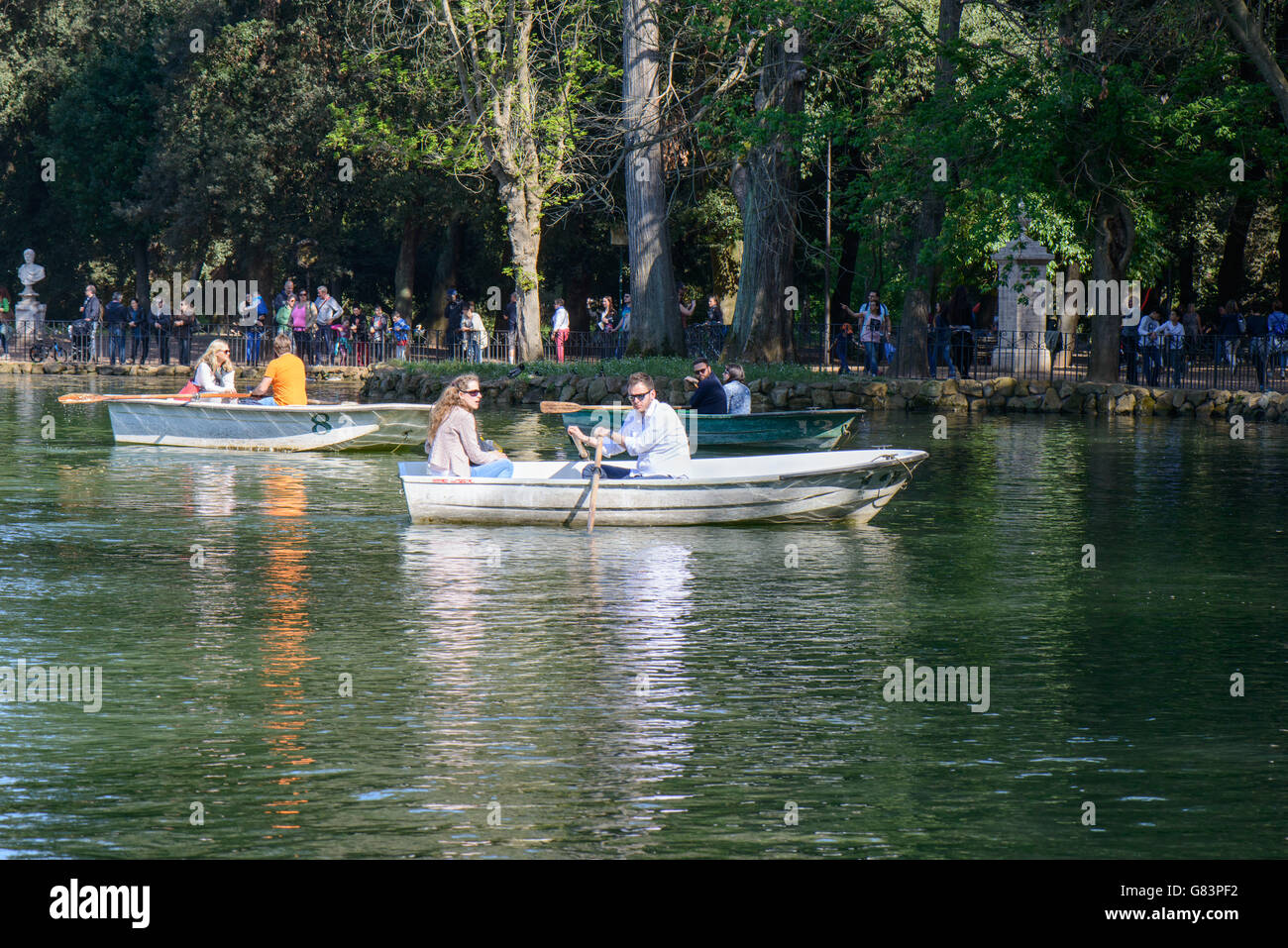 Nice lake called Borgese in a public garden in Rome, Italy, people in a ...