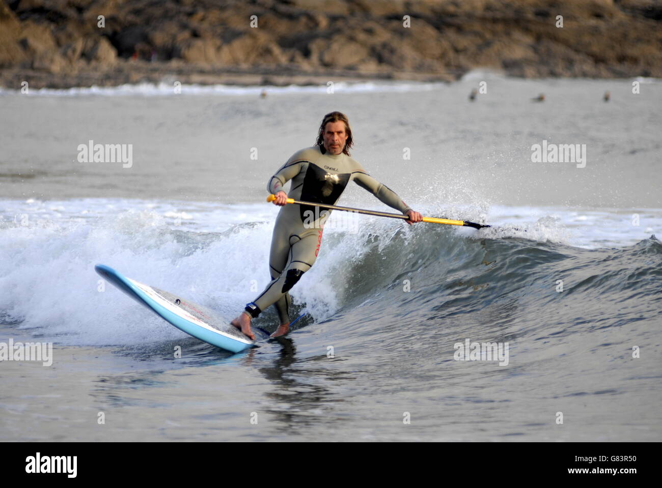 Top surfer Guts Griffiths surfing in Wales Stock Photo - Alamy