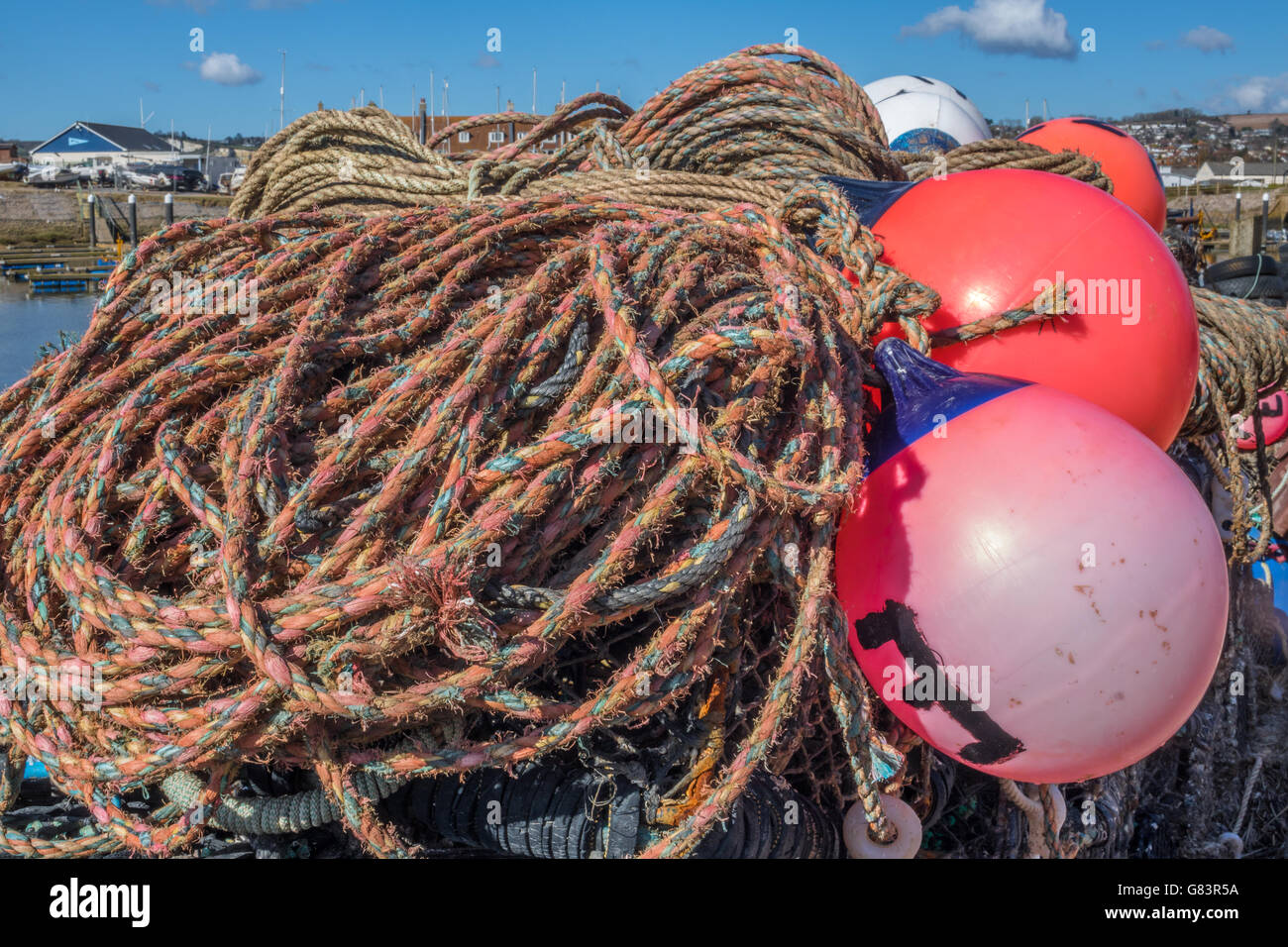 England Devon Seaton Lobster pots ropes and floats on the quay Adrian ...
