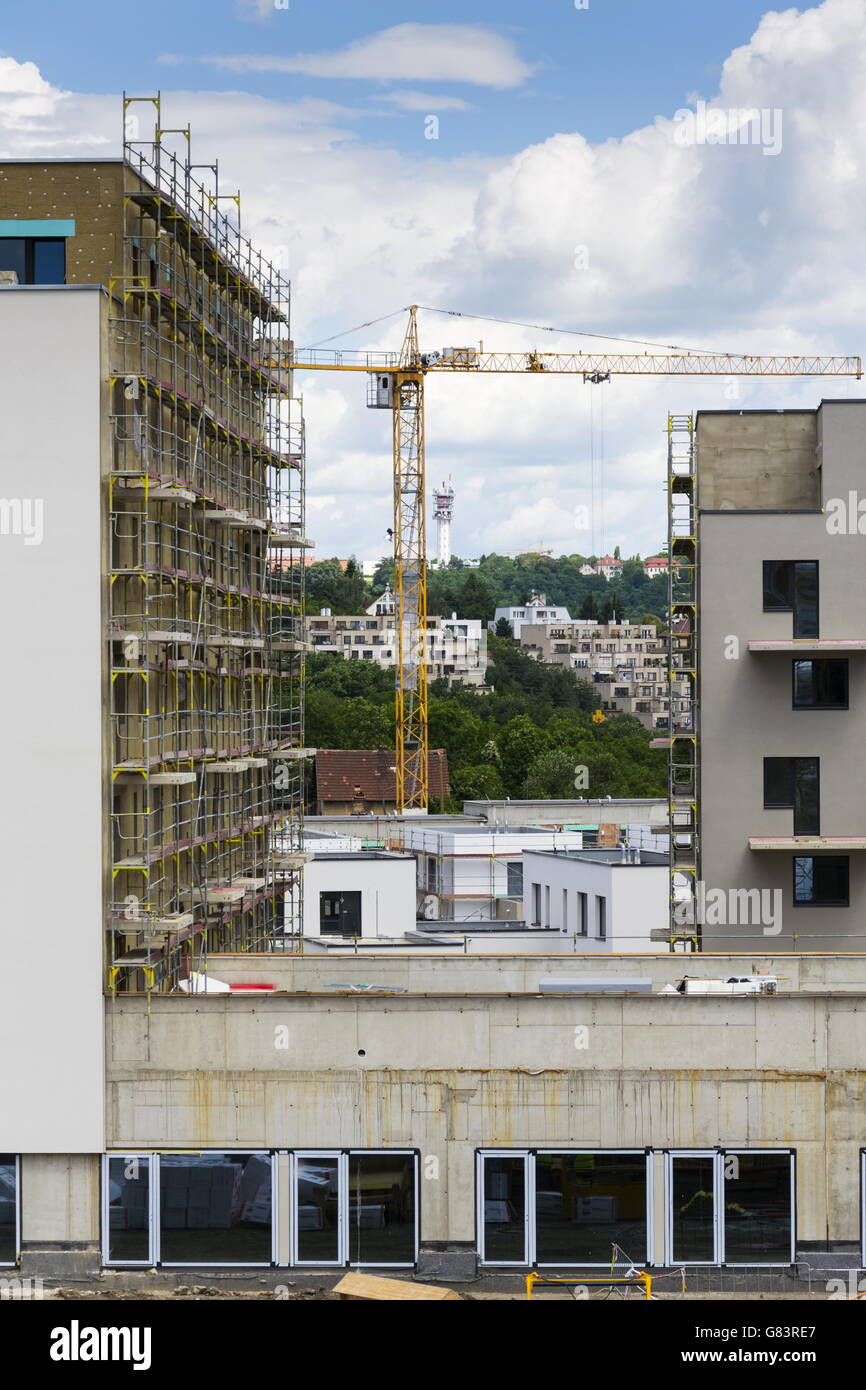 House apartment construction site with scaffolding Stock Photo - Alamy