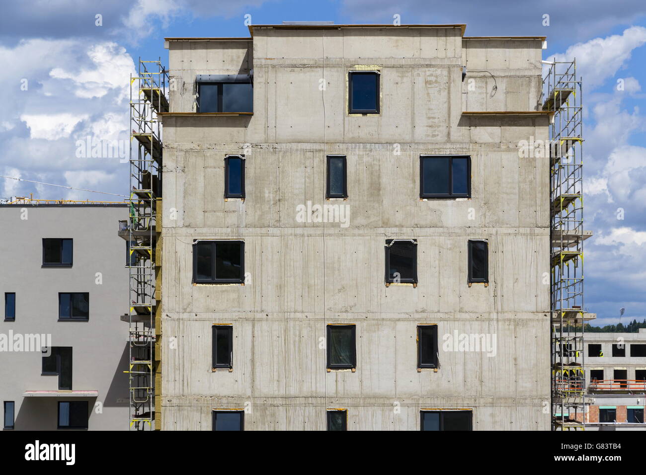 House apartment construction site with scaffolding Stock Photo - Alamy