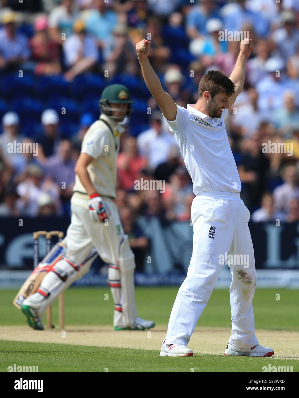 England bowler Mark Wood celebrates as he traps Australia batsman ...
