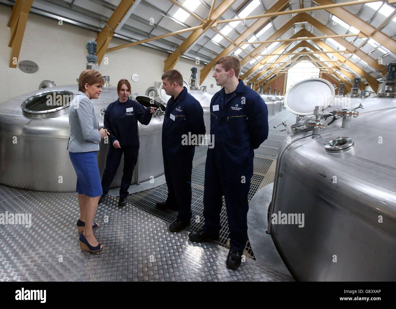First Minister Nicola Sturgeon (left) talks to Lisa Glen, distillery ...