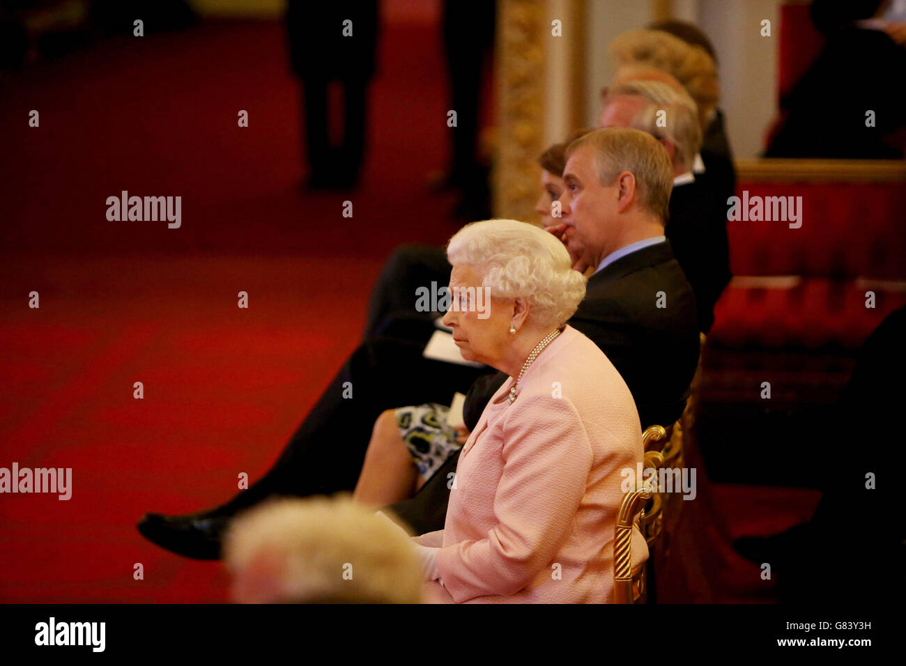 Queen Elizabeth II listens to speeches at a reception at Buckingham ...