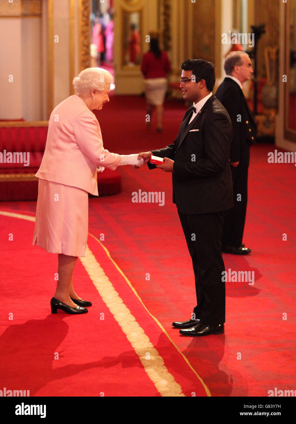 Aaron Joshua Pinto from Canada meets Queen Elizabeth II at Buckingham ...