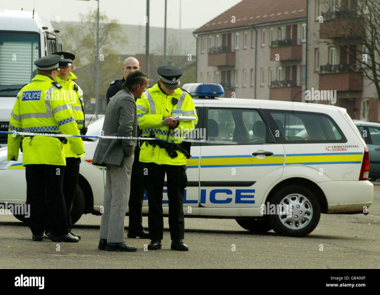 Gartloch Road Shooting. Strathclyde Police stand at the scene of the ...