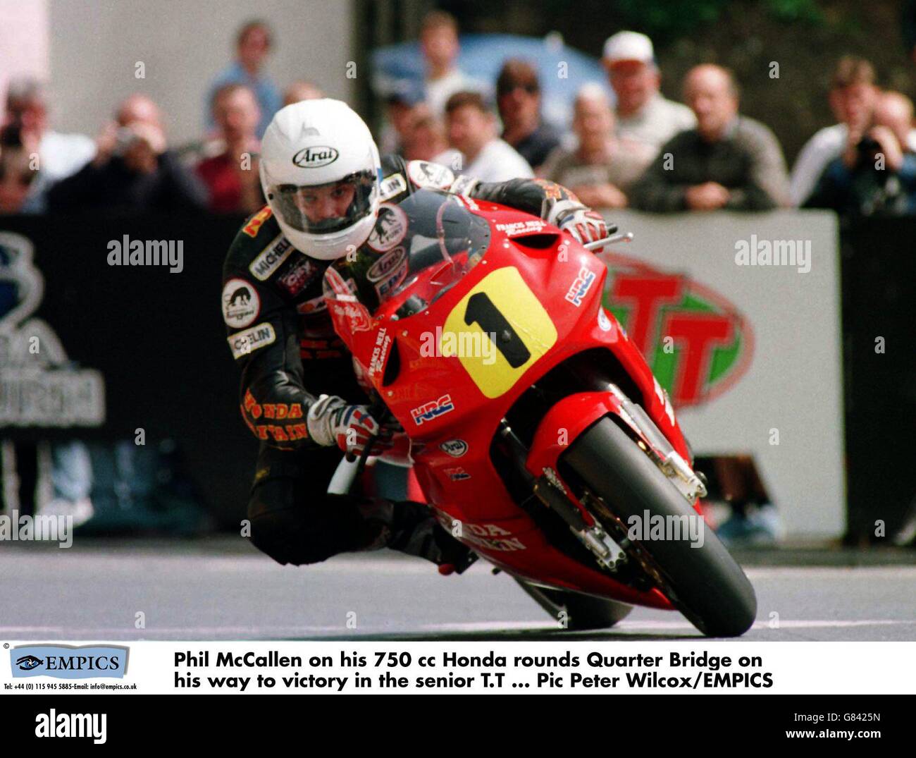 Phil McCallen on his 750 cc Honda rounds Quarter Bridge on his way to ...