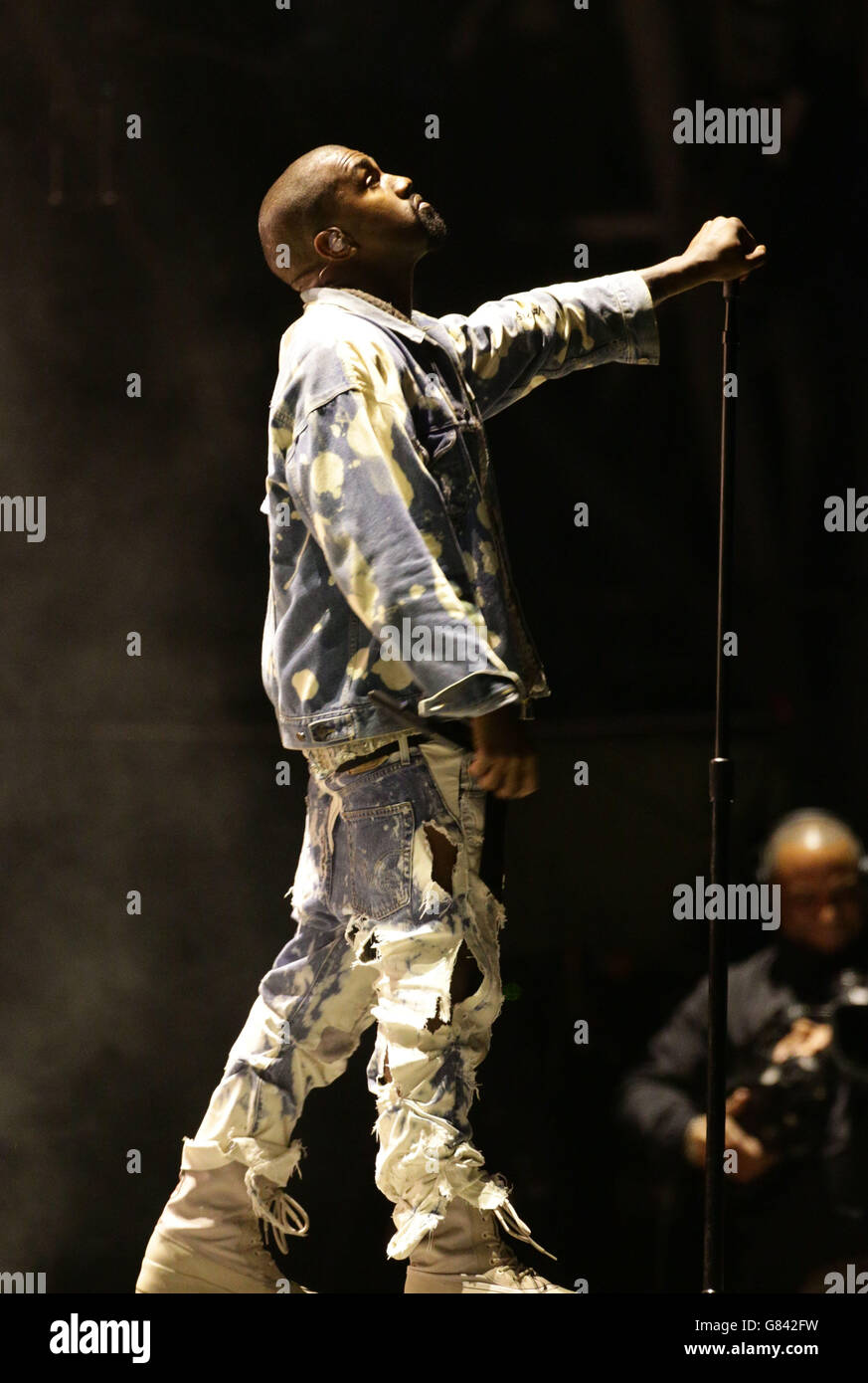 Kanye West performing on the Pyramid Stage at the Glastonbury Festival ...
