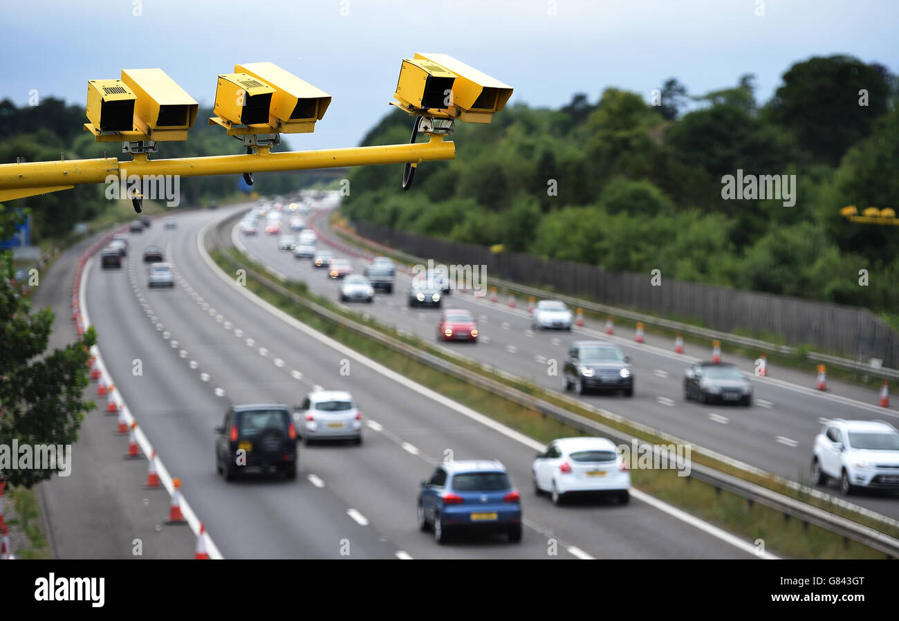 General view of three SPECS Average Speed cameras in position on the M3 ...