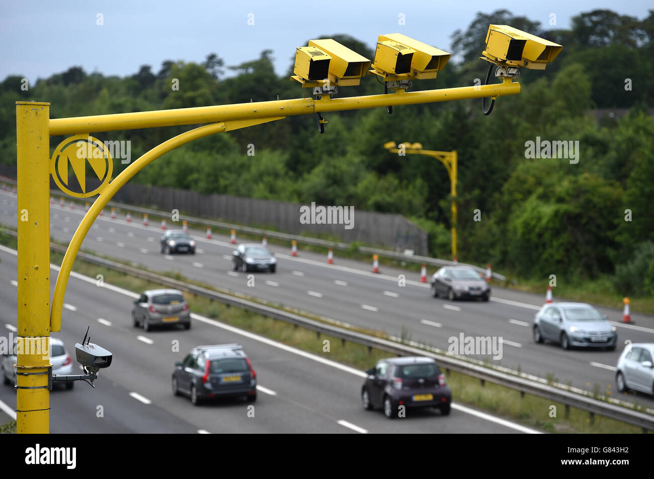 General view of three SPECS Average Speed cameras in position on the M3 ...