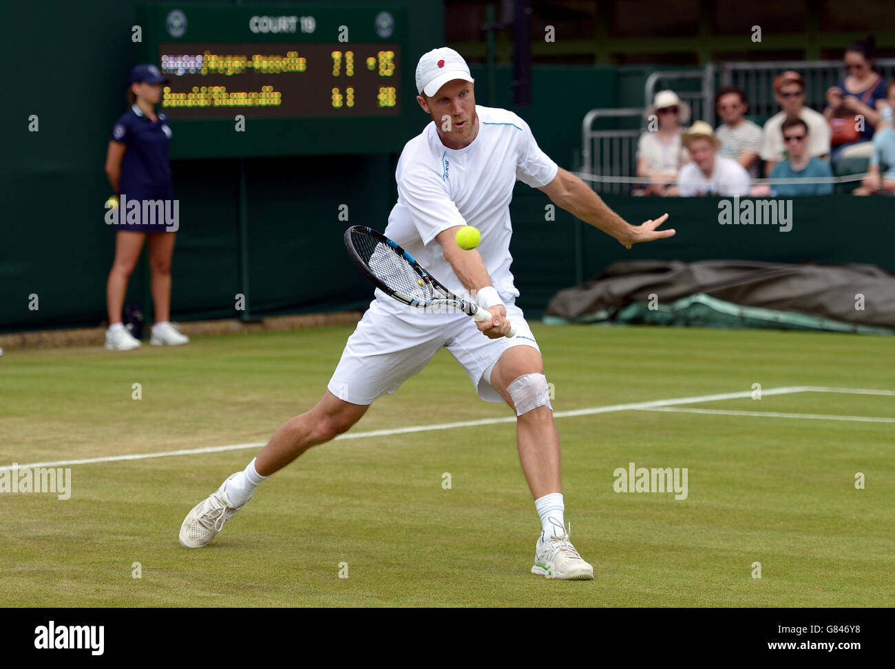 Dominic Inglot in action during his doubles match with Edouard Roger ...