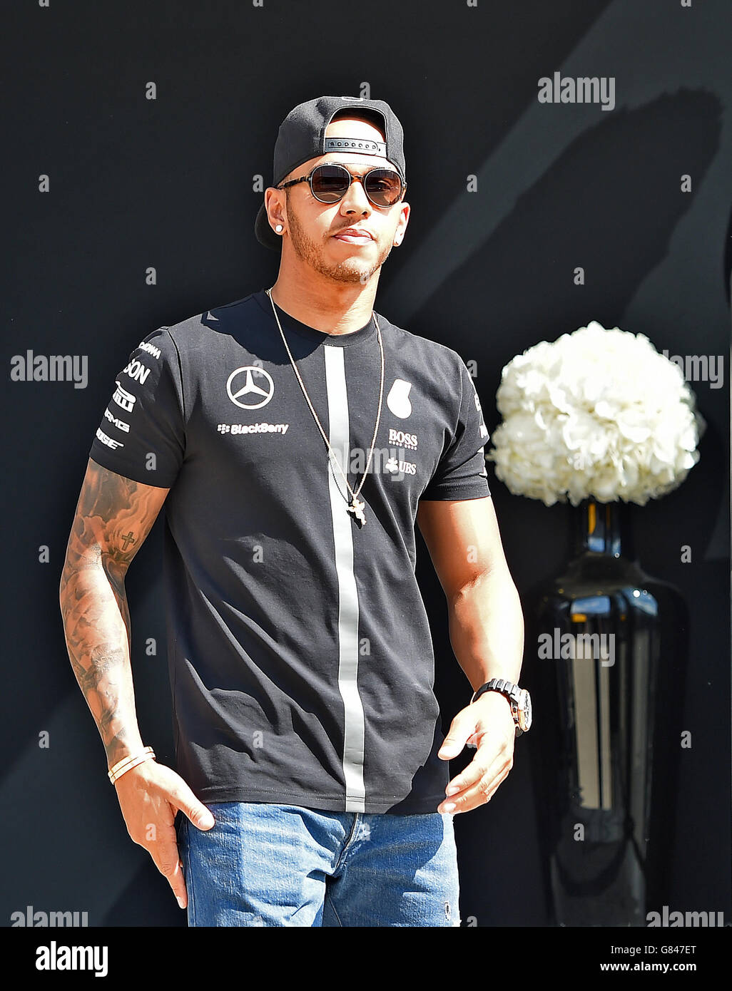 Mercedes driver Lewis Hamilton leaves the team motorhome, during ...