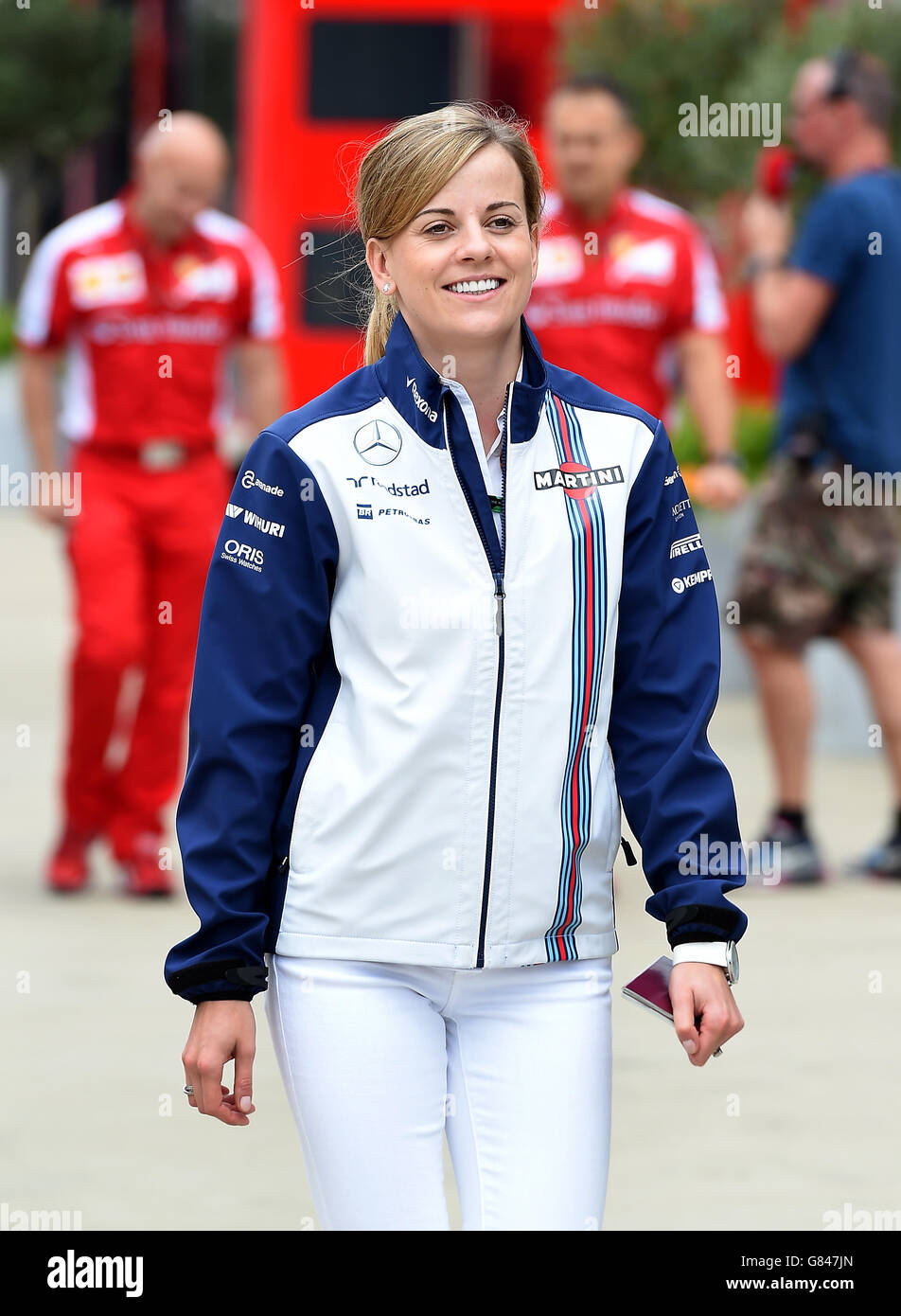 Williams test driver Susie Wolff walks through the Paddock, during ...
