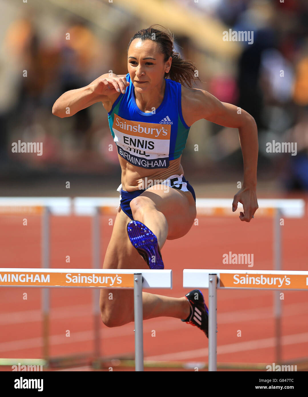 Jessica Ennis-Hill wins her women's 100 metre hurdles heat during day ...