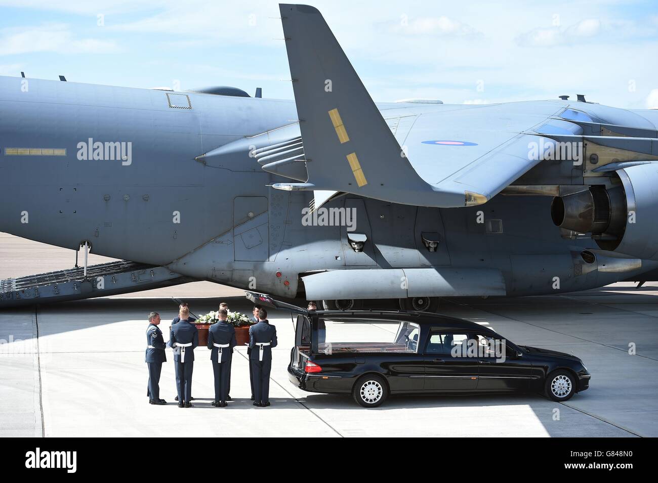 The coffin of Lisa Burbidge is placed in a hearse at RAF Brize Norton ...