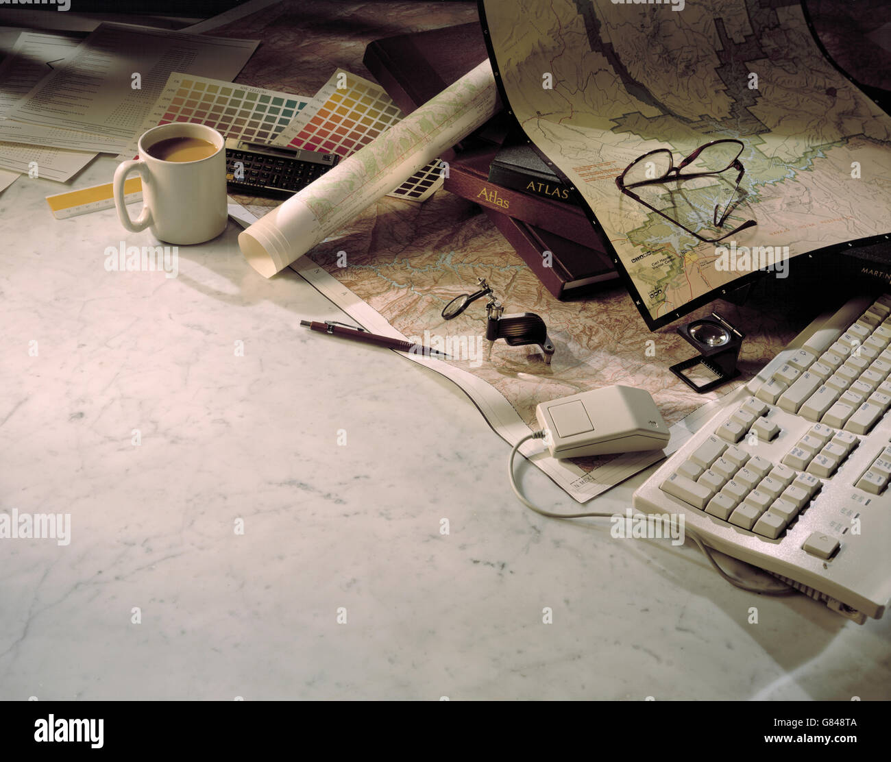 architectural designer mapmaker desk Stock Photo - Alamy