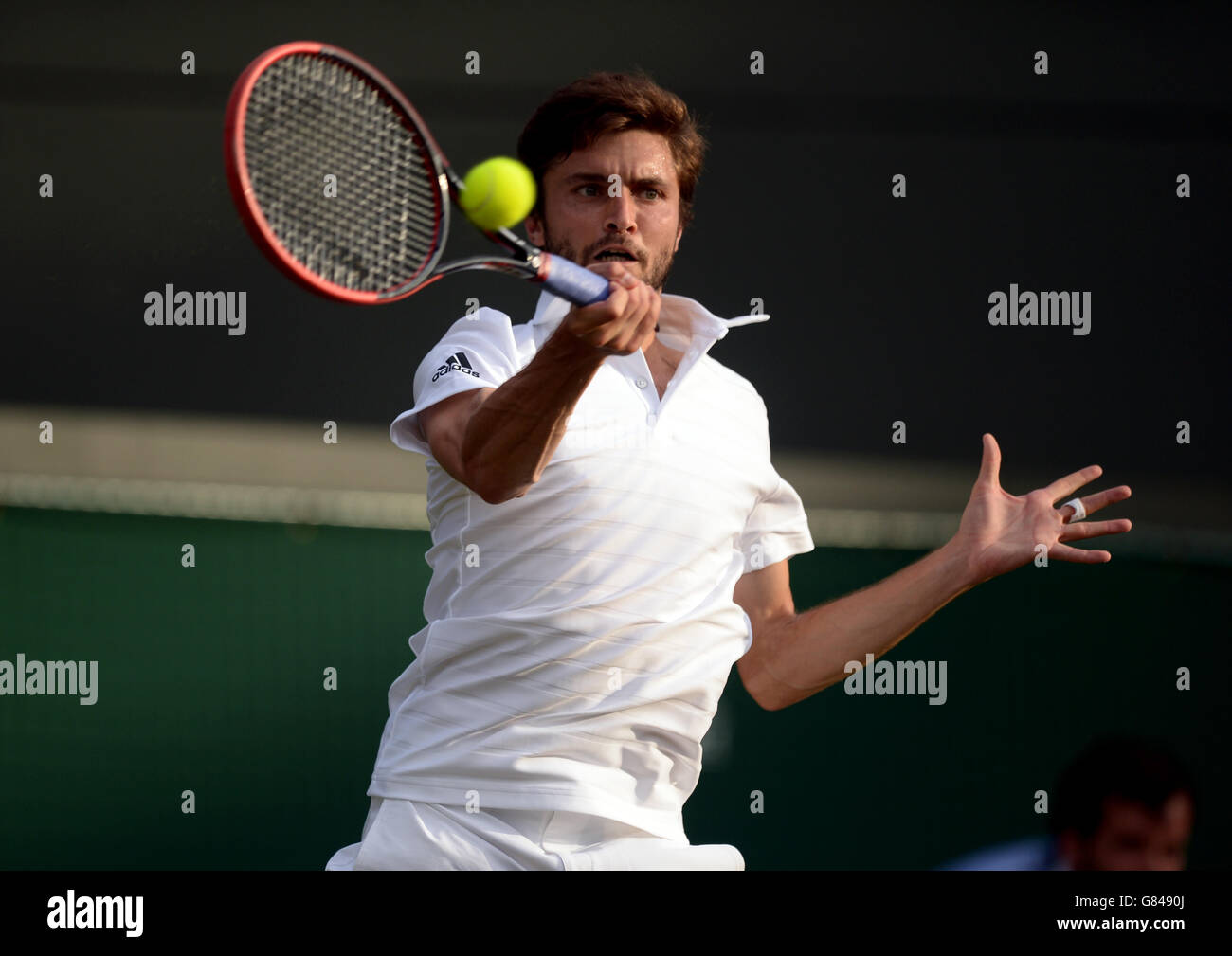 Giles Simon in action against Gael Monfils during day Six of the ...