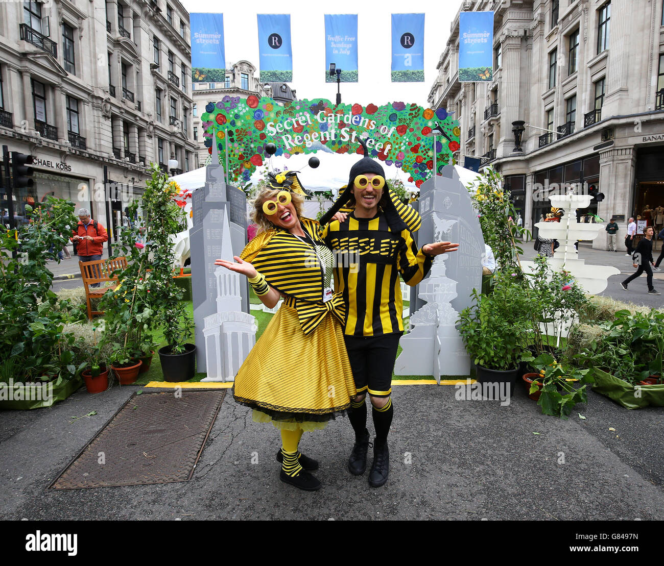 Performers promote beekeeping in the Regent Street Secret Garden in ...