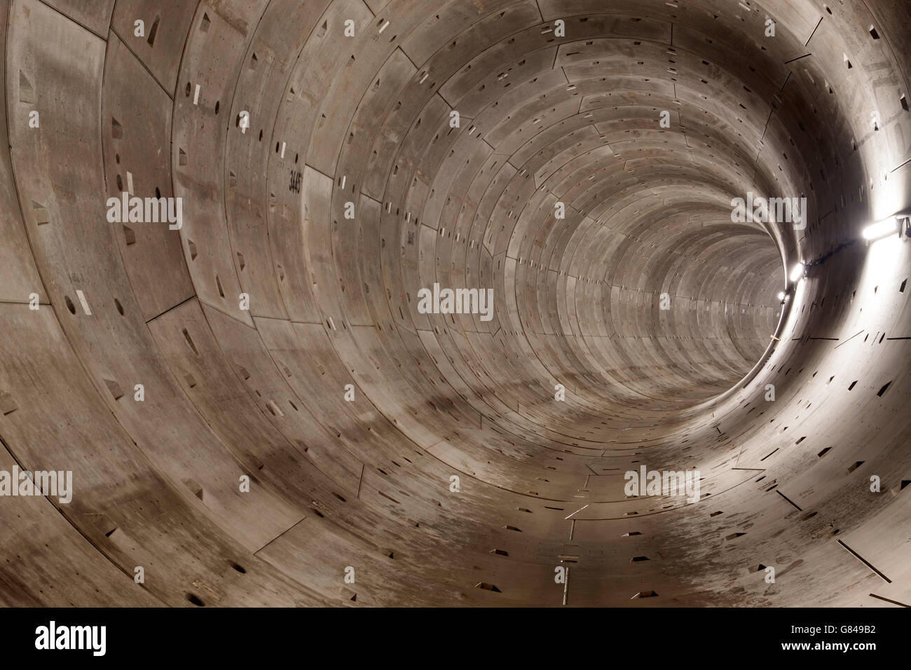 Round concrete elements of a built subway tunnel under construction ...