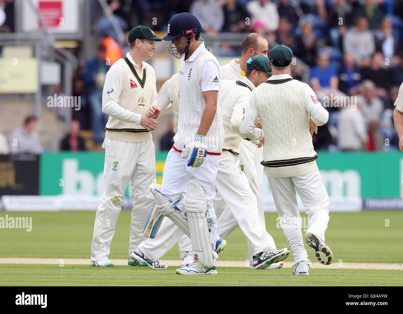 England's Alastair Cook is caught by Brad Hadden for 20 during the ...